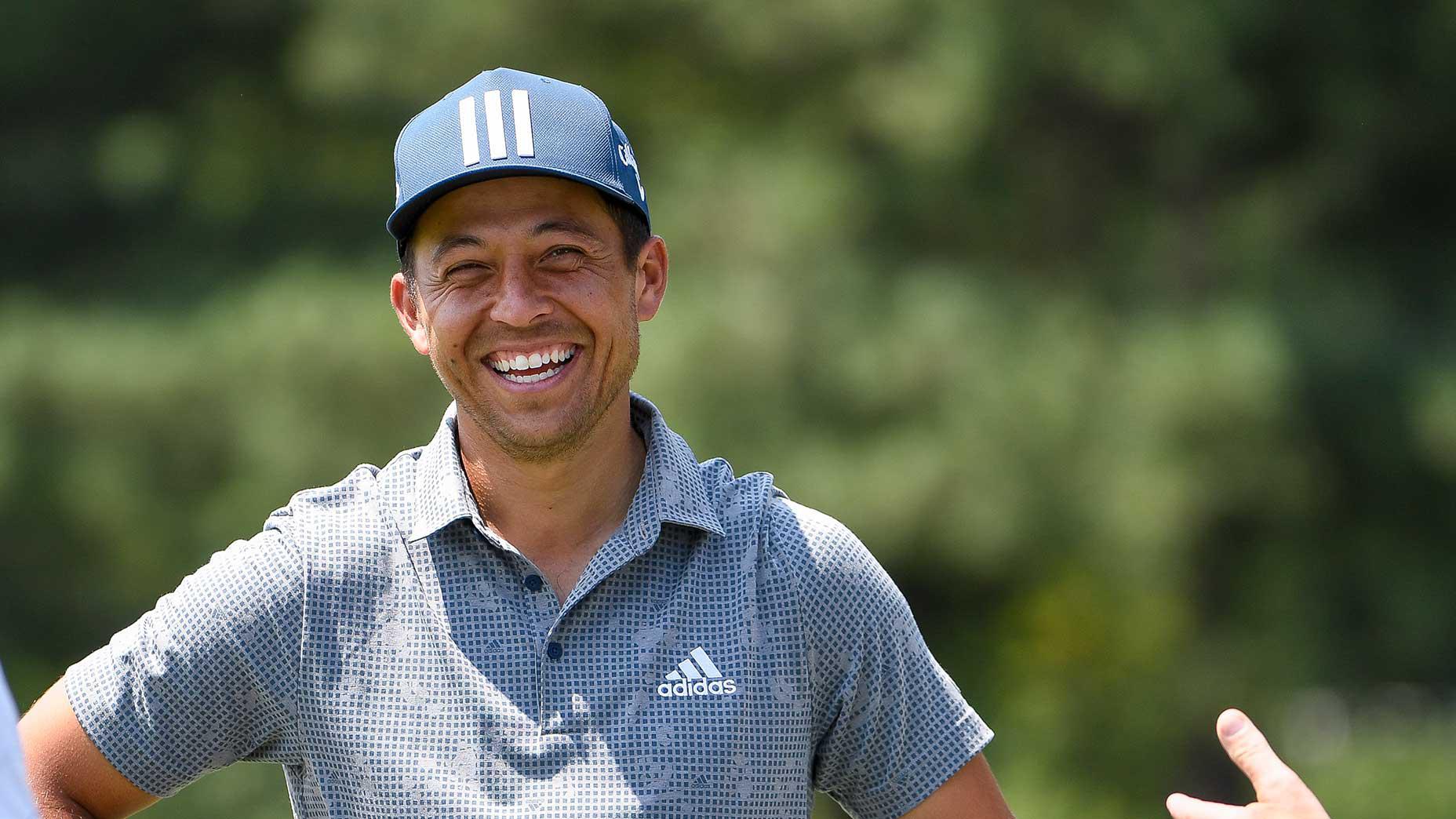 Unveiling the Meaning Behind Xander Schauffele's Vibrantly Colored ...